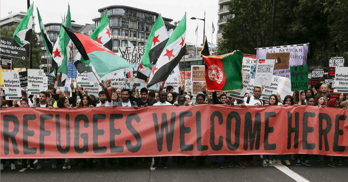 Refugees Welcome: Thousands March for 'Humanity and Human Rights' in UK ...