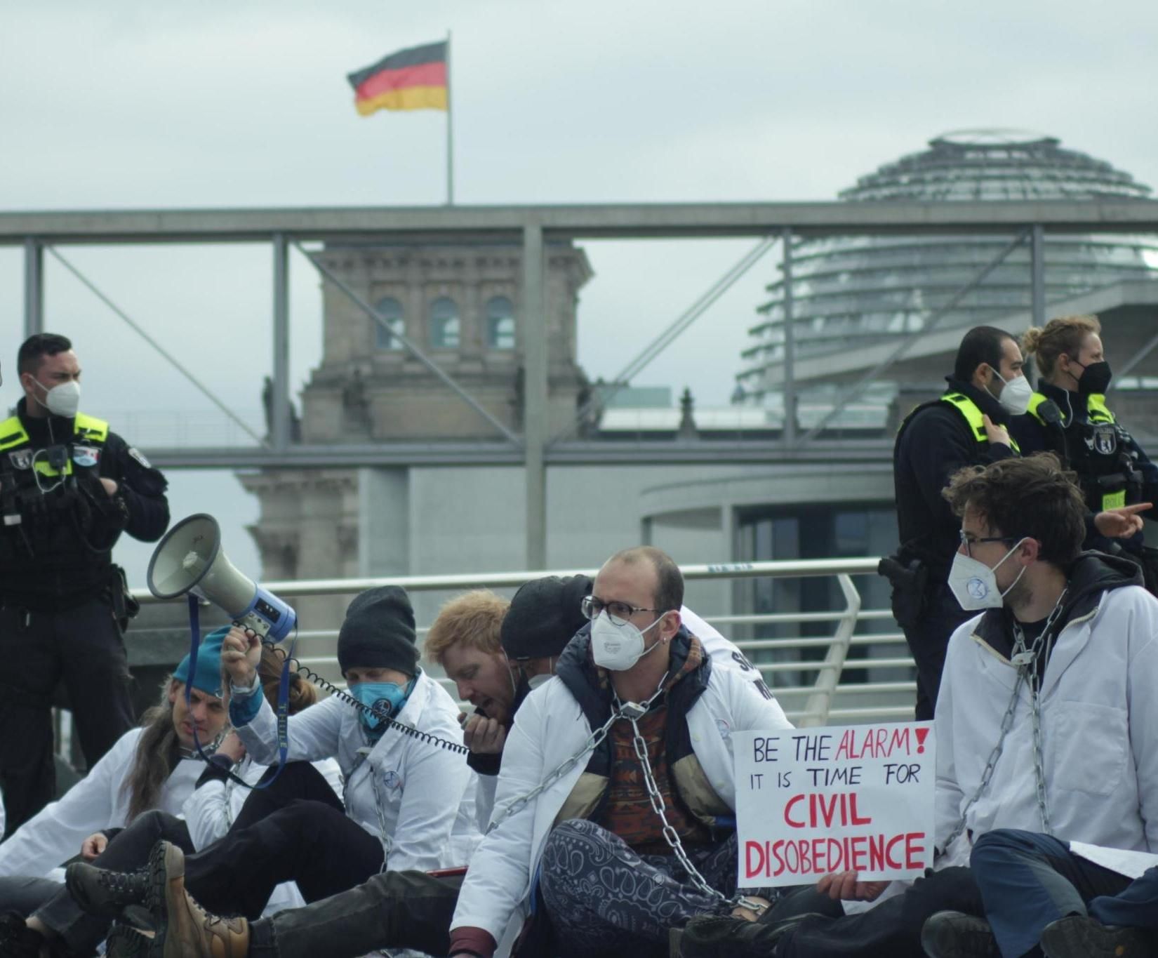 Climate Scientists Urge More Civil Disobedience to Signal 'How Deep in ...