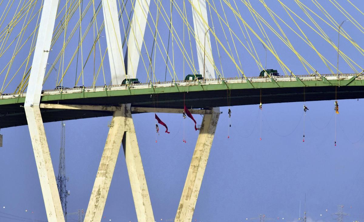 Climate Activists Who Blocked Houston Bridge to Fossil Fuel Traffic ...