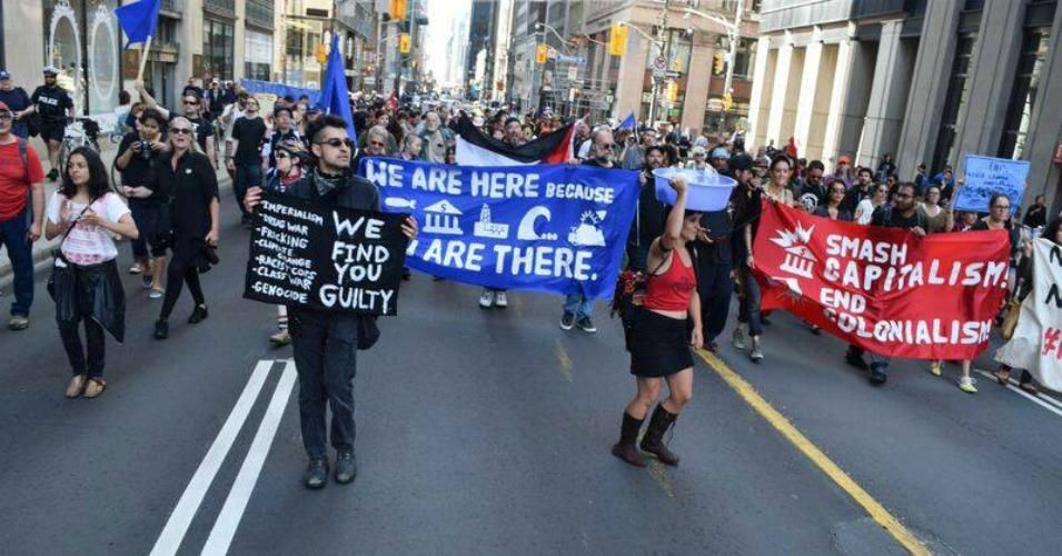 Protests Target 'Human Rights Abusers Determining Our Future' at Summits